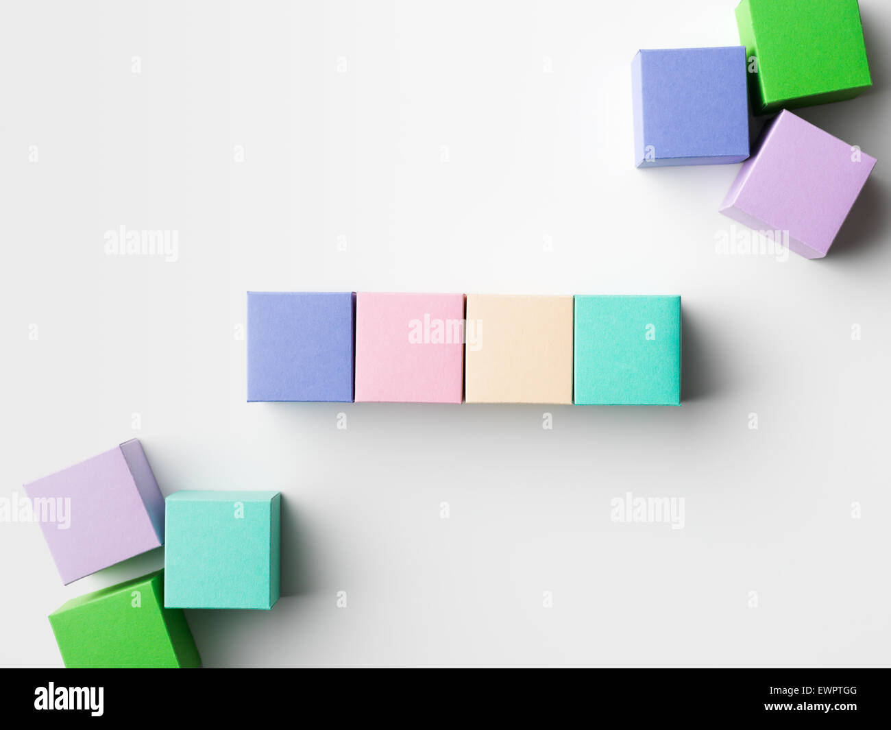 close-up of empty colorful paper cubes on white background. copy space ...