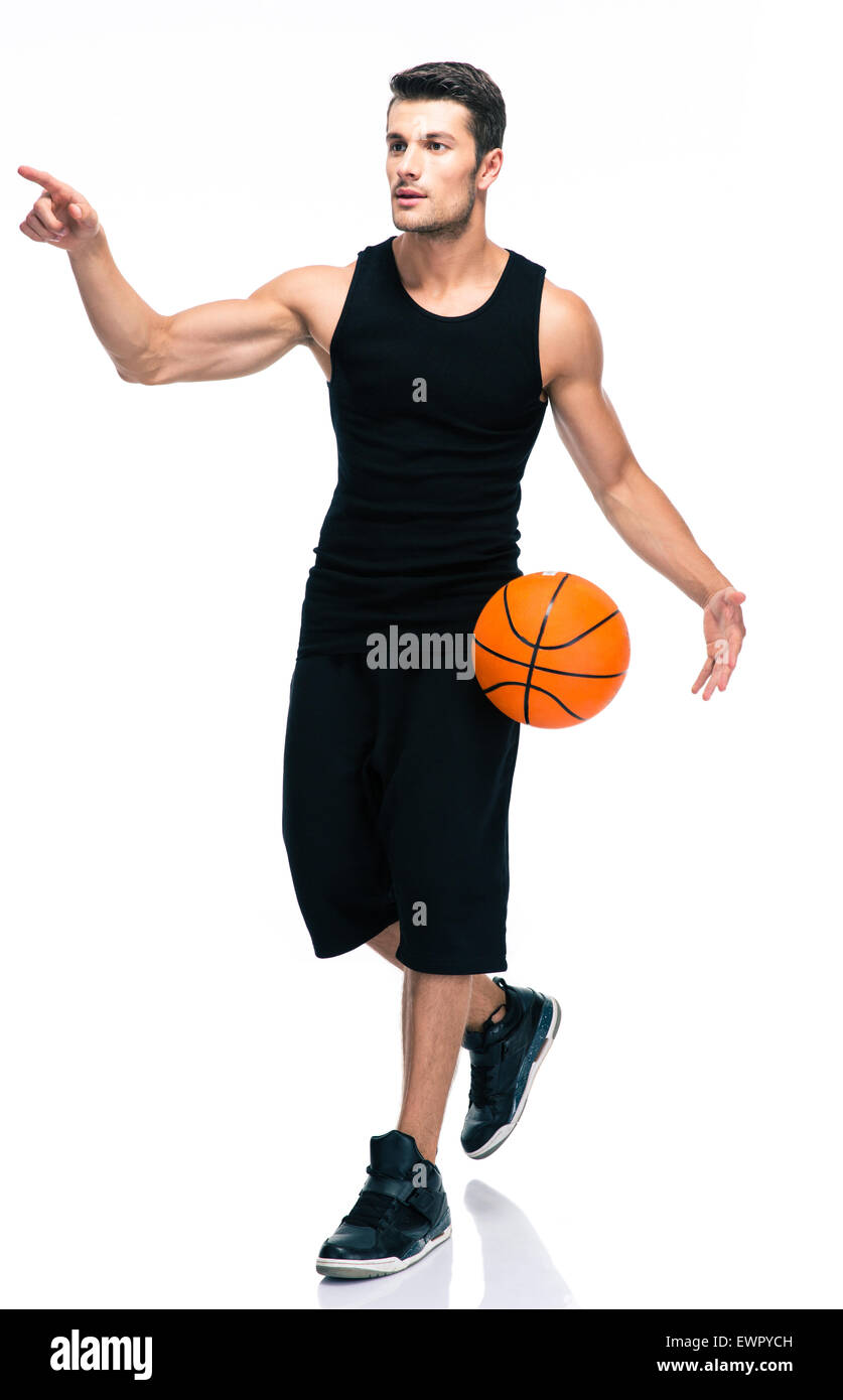 Portrait of a sports man playing in basketball isolated on a white ...