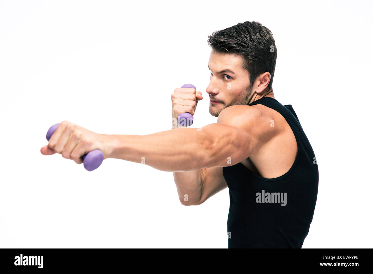 Sports man working out with small dumbbells isolated on a white ...