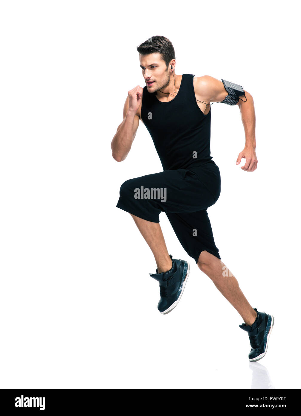 Full length portrait of a fitness man running isolated on a white ...