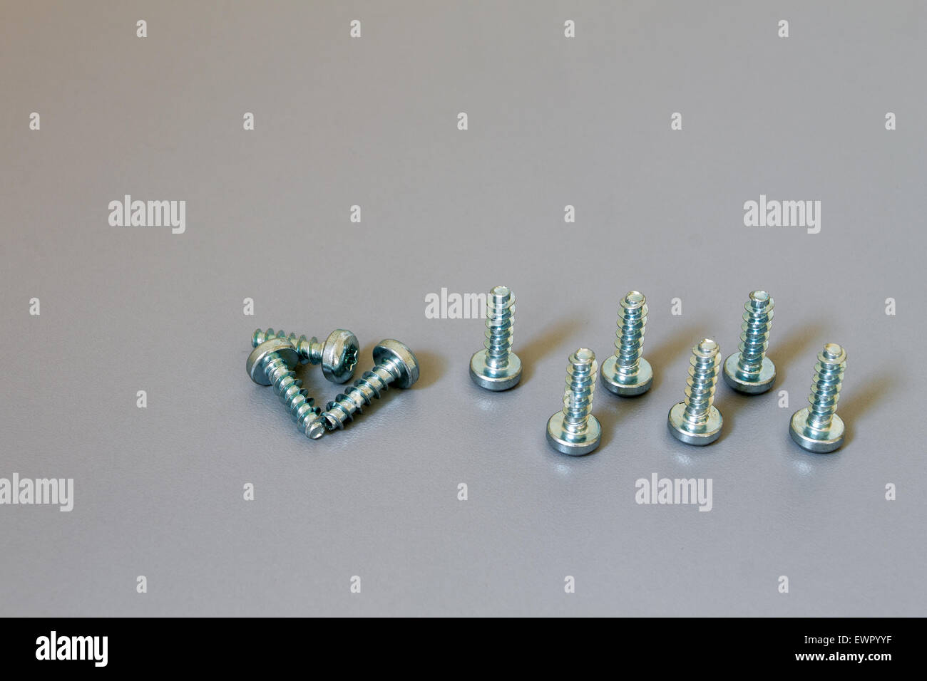 Nine threaded screws, detail view, mechanical components Stock Photo ...