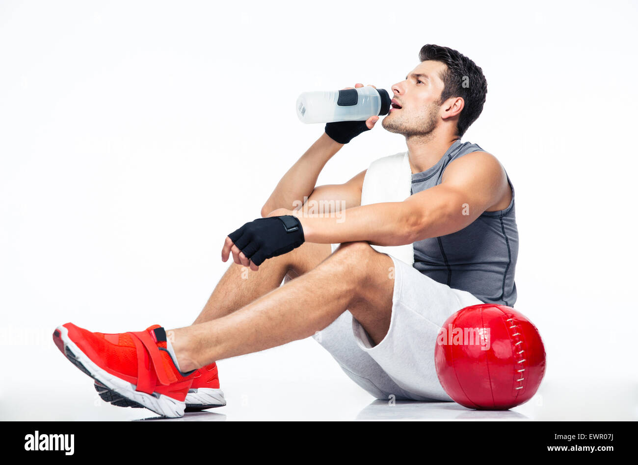 Muscular man sitting on floor hi-res stock photography and images - Alamy