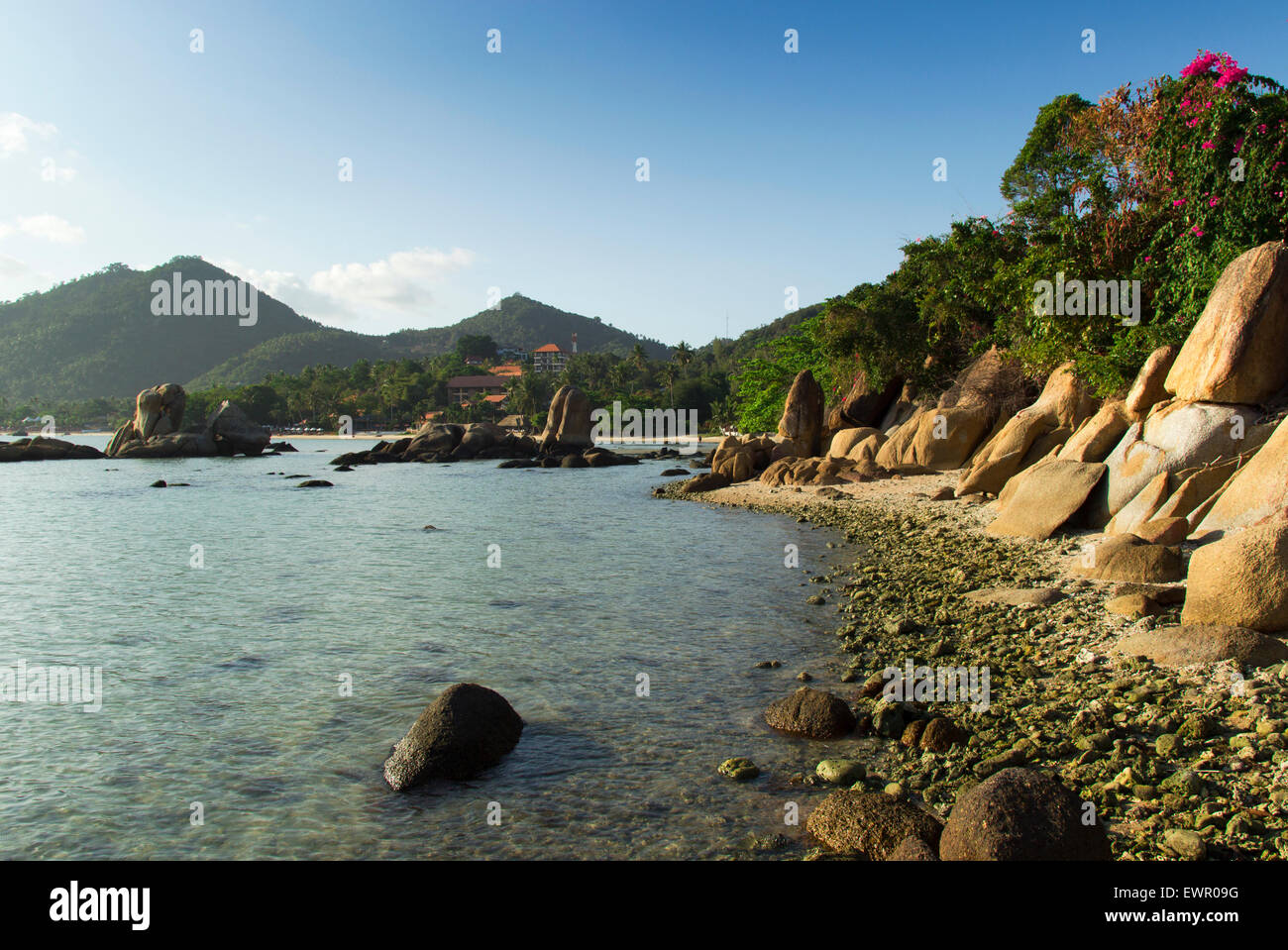 sea water ripple on coral beach near paradise resort. summer tropical ...