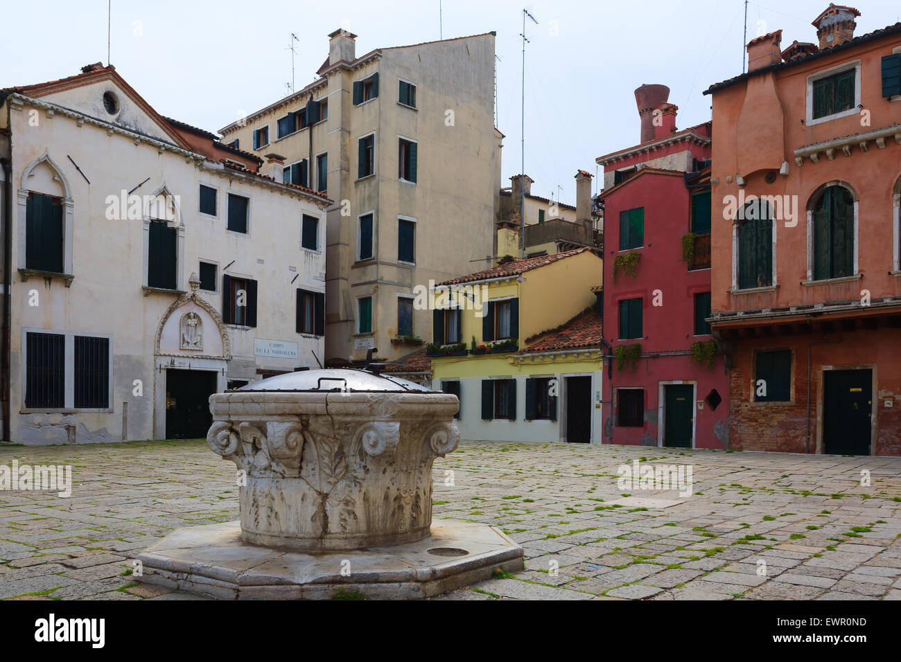 A view from Venice, little square with colorful houses, Italy Stock ...