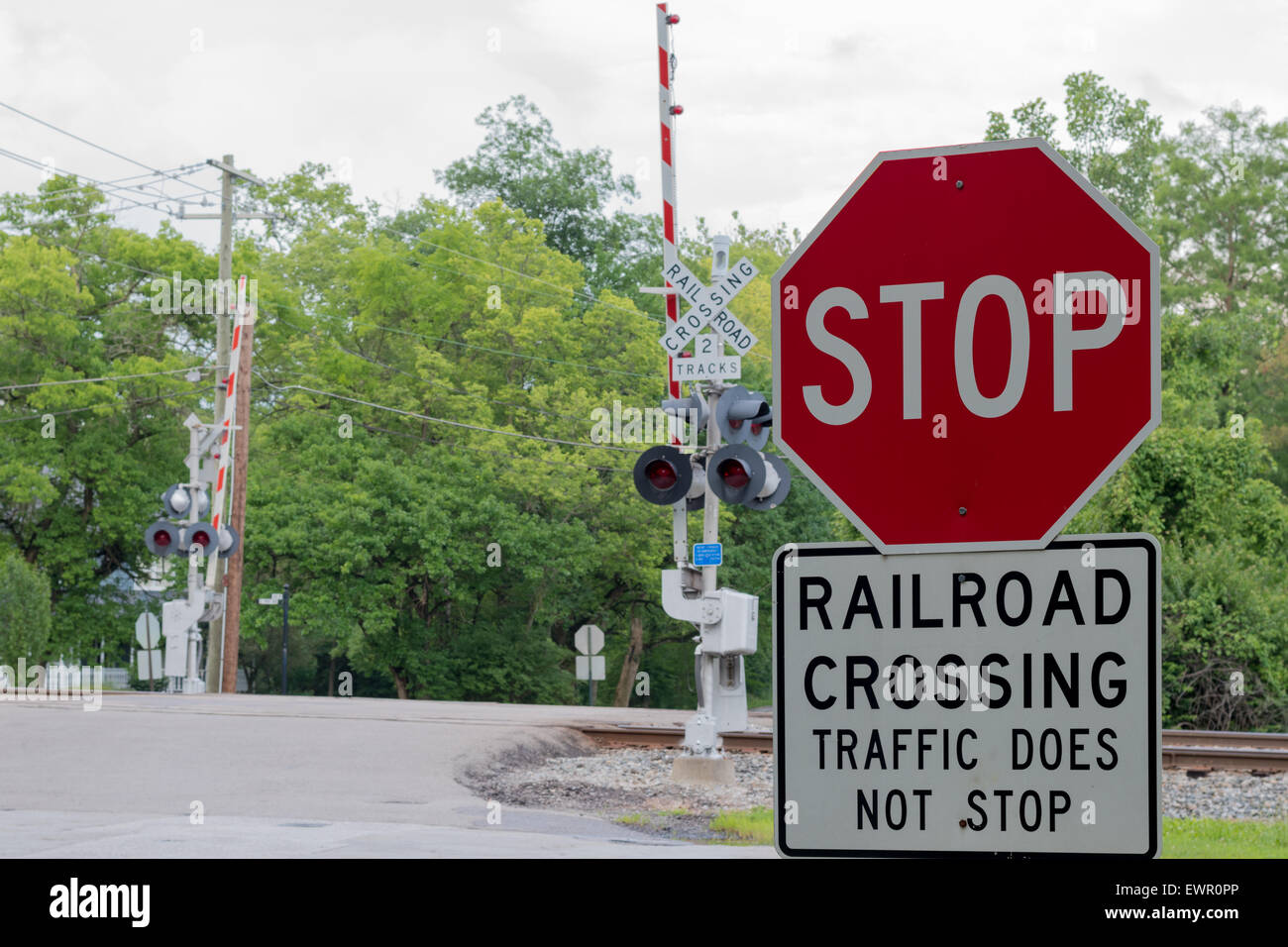 Railroad Crossing Stop Sign Stock Photo - Alamy