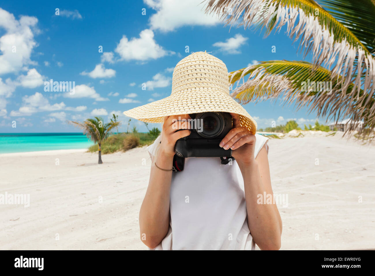 Image of caucasian woman taking photos in the Bahamas Stock Photo - Alamy