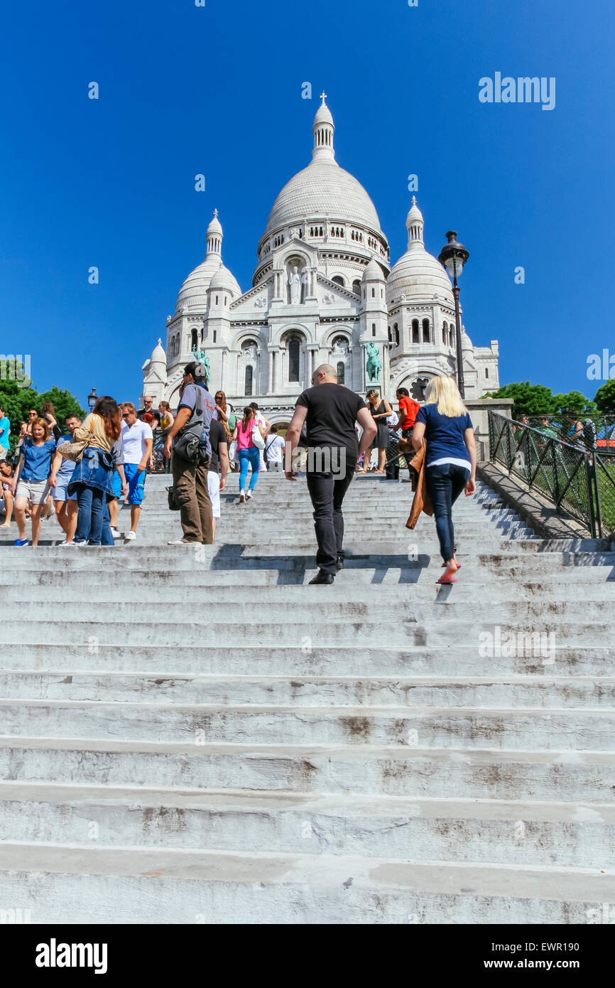 Crowds of tourists on stairs of Sacre Coeur Basilica, Montmartre, Paris ...