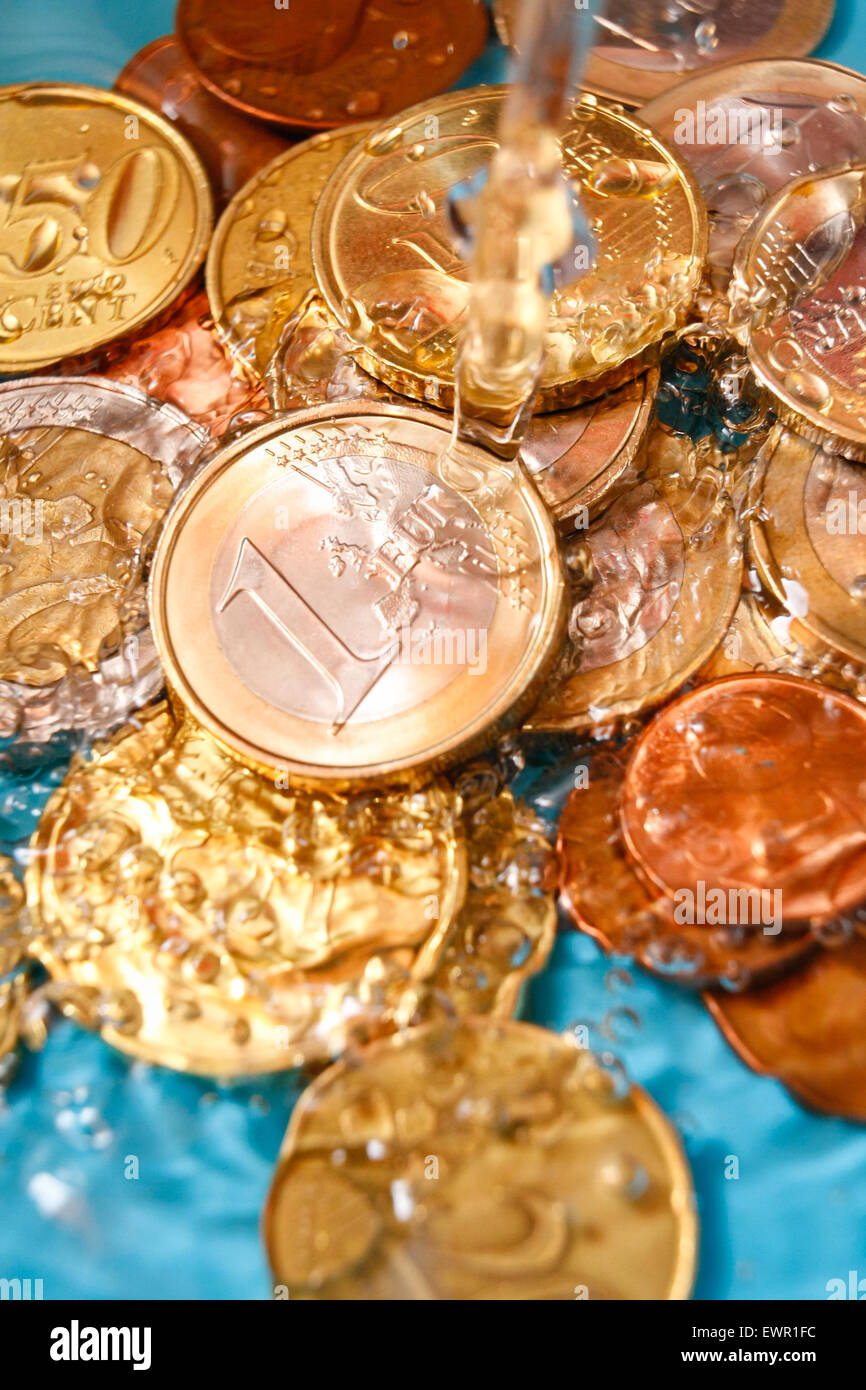 Water price concept with euro currency coins and water drops, vertical ...