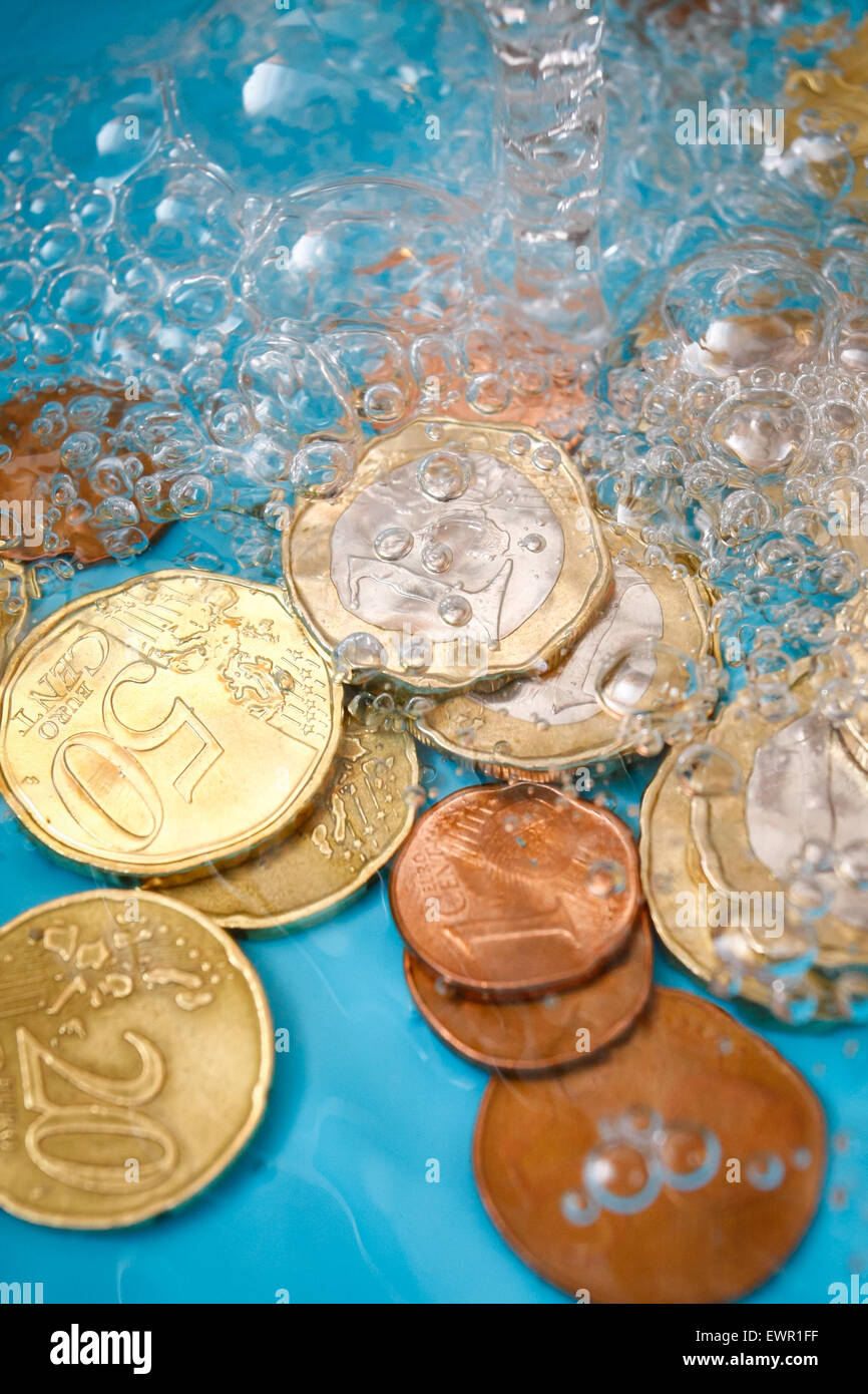 Water price concept with euro currency coins and water drops, vertical ...