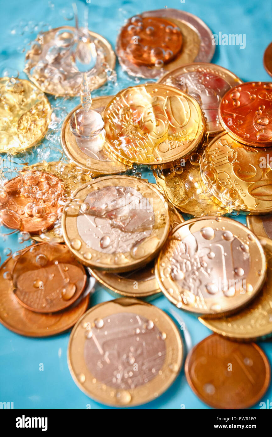 Water price concept with euro currency coins and water drops, vertical ...