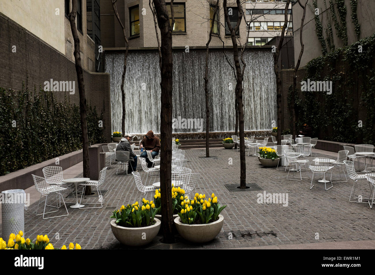 Empty lot on Manhattan turned into a mini park with a water-fall Stock ...