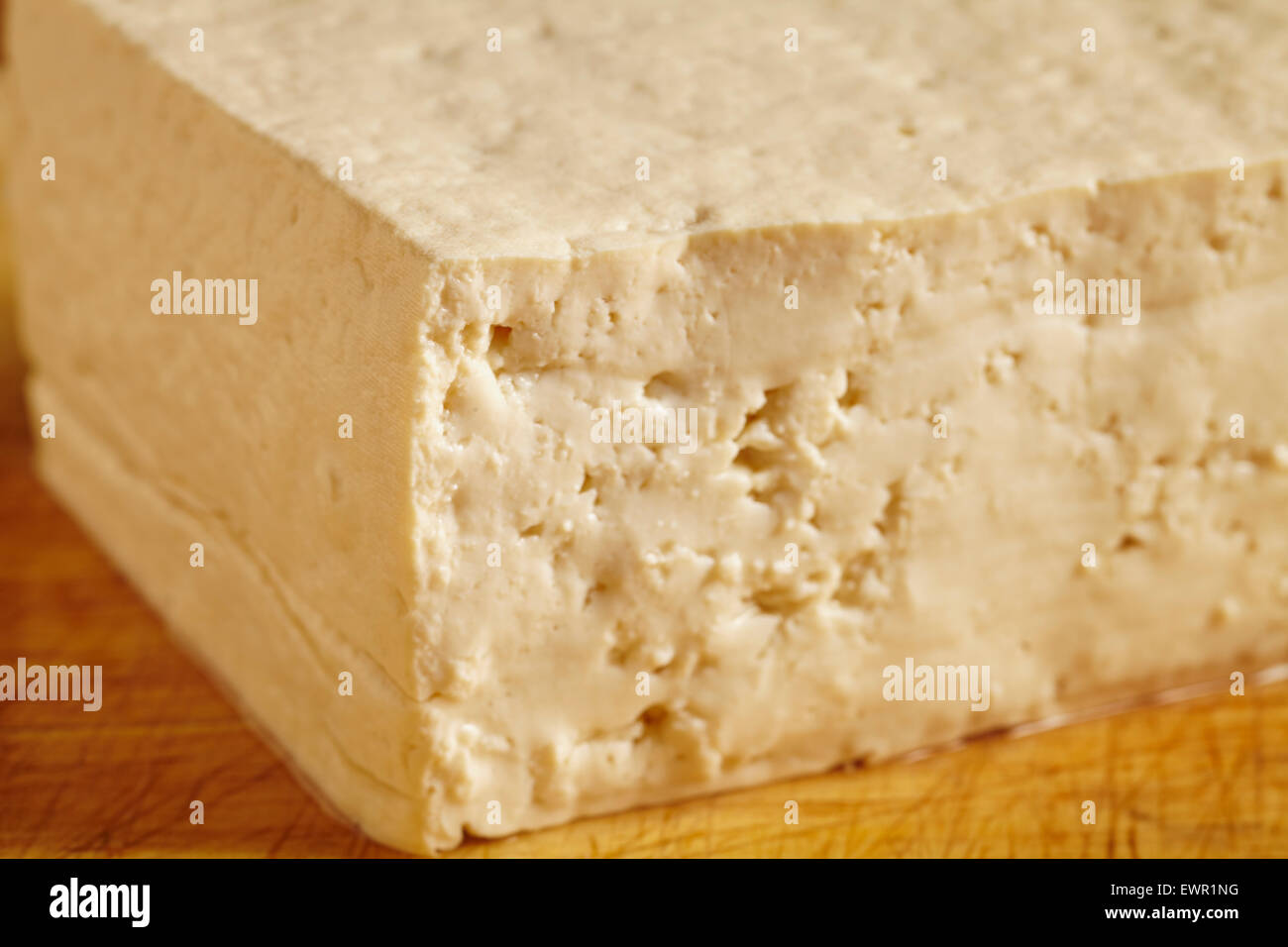 Cake of drained firm tofu. This is a typical American retail form Stock ...