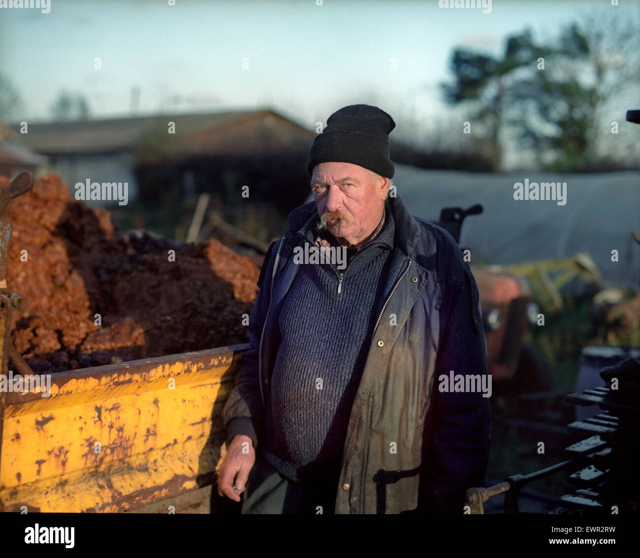 farmer making cider in Normandy Stock Photo - Alamy