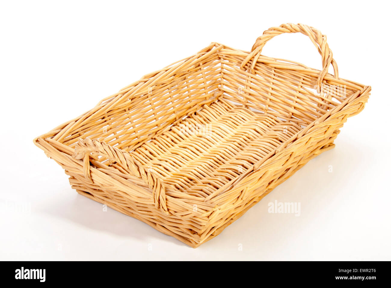 Above view of rectangular woven wicker basket on white Stock Photo - Alamy