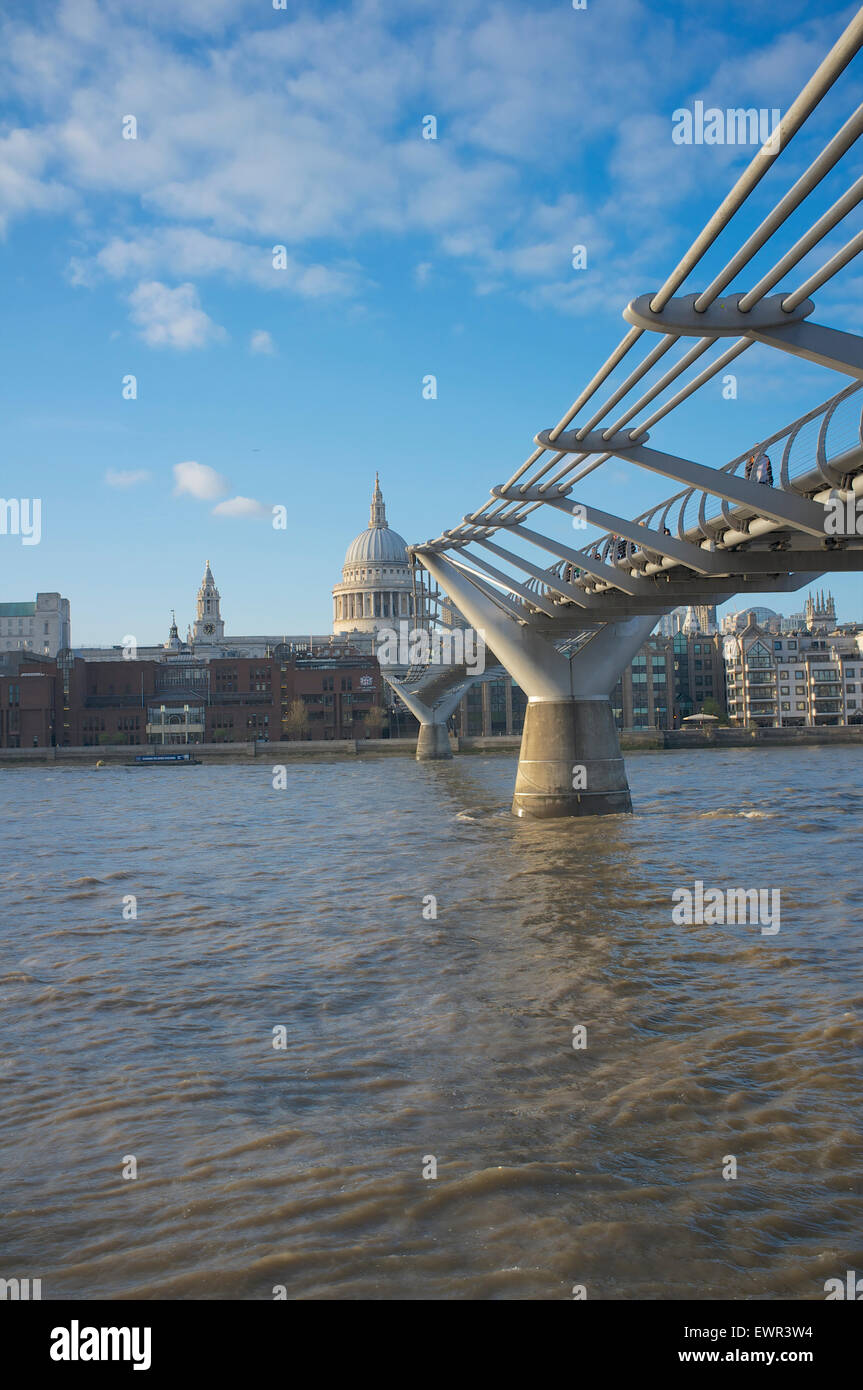 Millennium Bridge over Rover Thames in London with St Paul's Cathedral ...