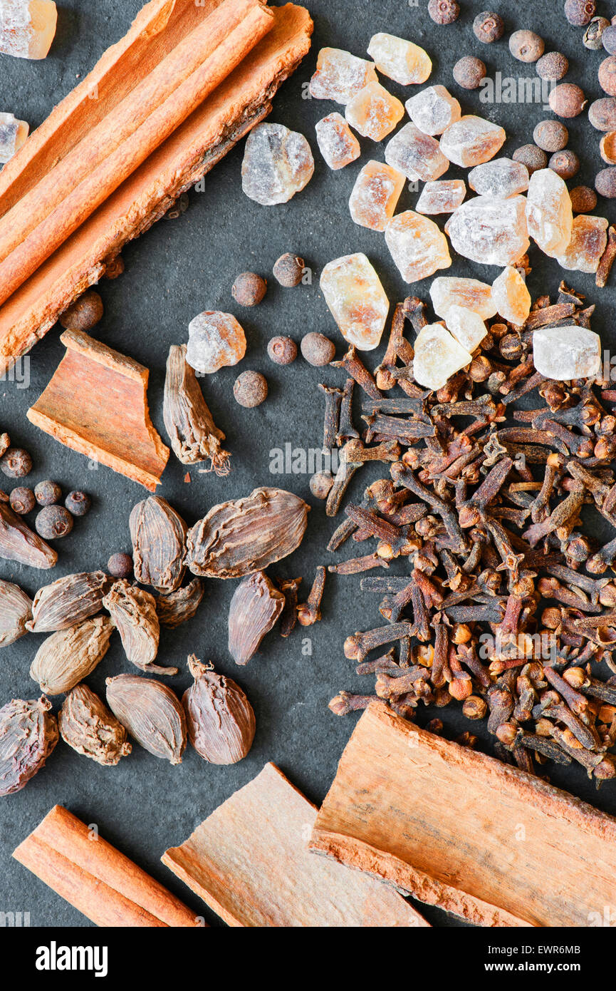 Fragrant spices on a dark background Stock Photo - Alamy