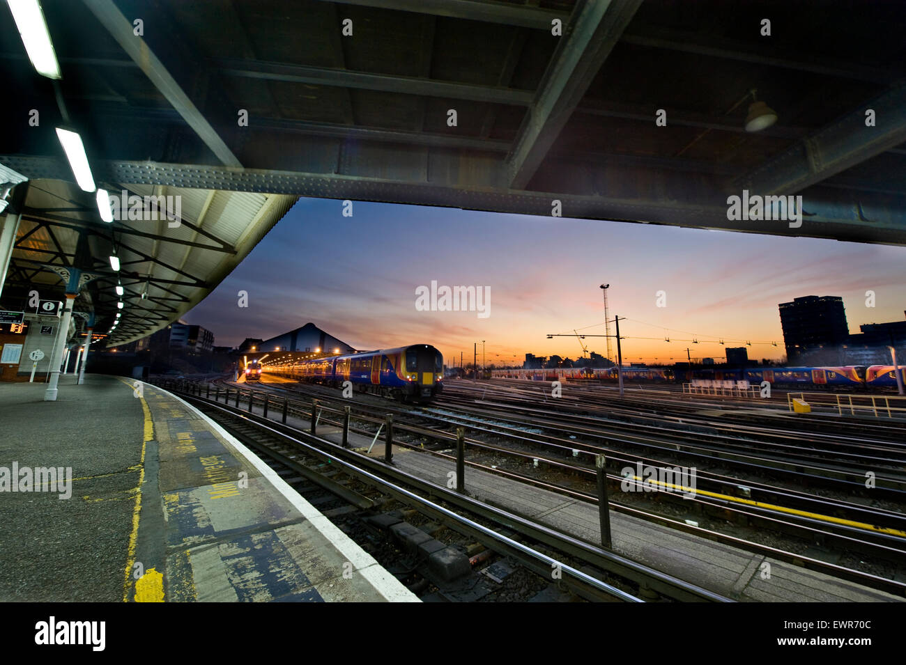 Dusk at Clapham Junction railway station Stock Photo - Alamy