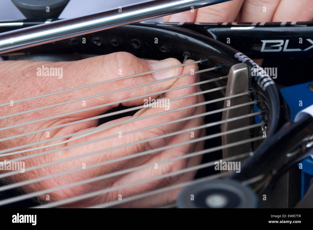 Tennis Racket in Stringing Machine Being Repaired Stock Photo - Alamy