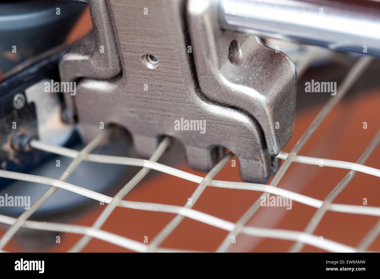 Tennis Racket in Stringing Machine Being Repaired Stock Photo - Alamy