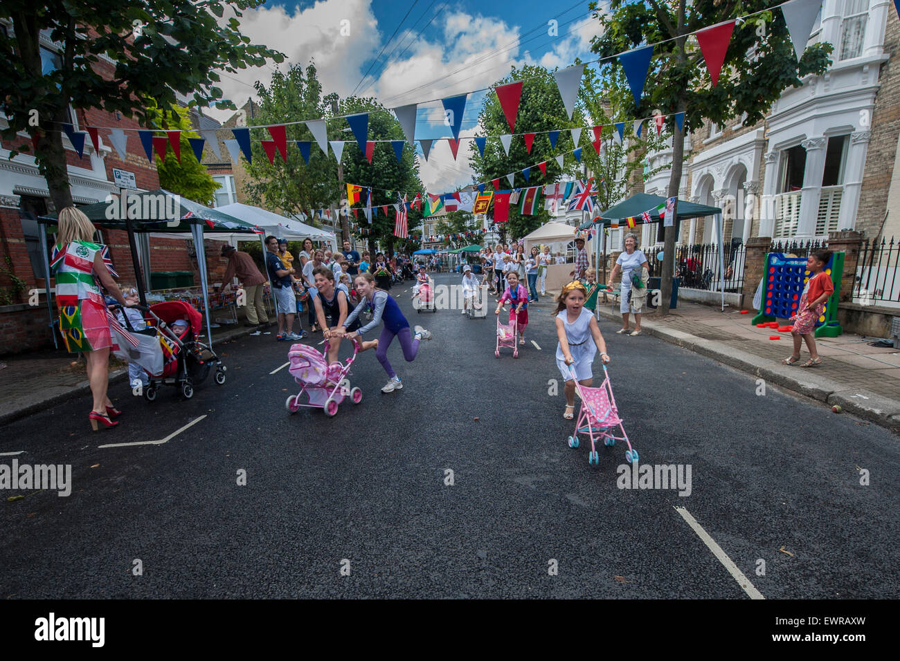 A street party with lots of flags and union jacks to celebrate the ...