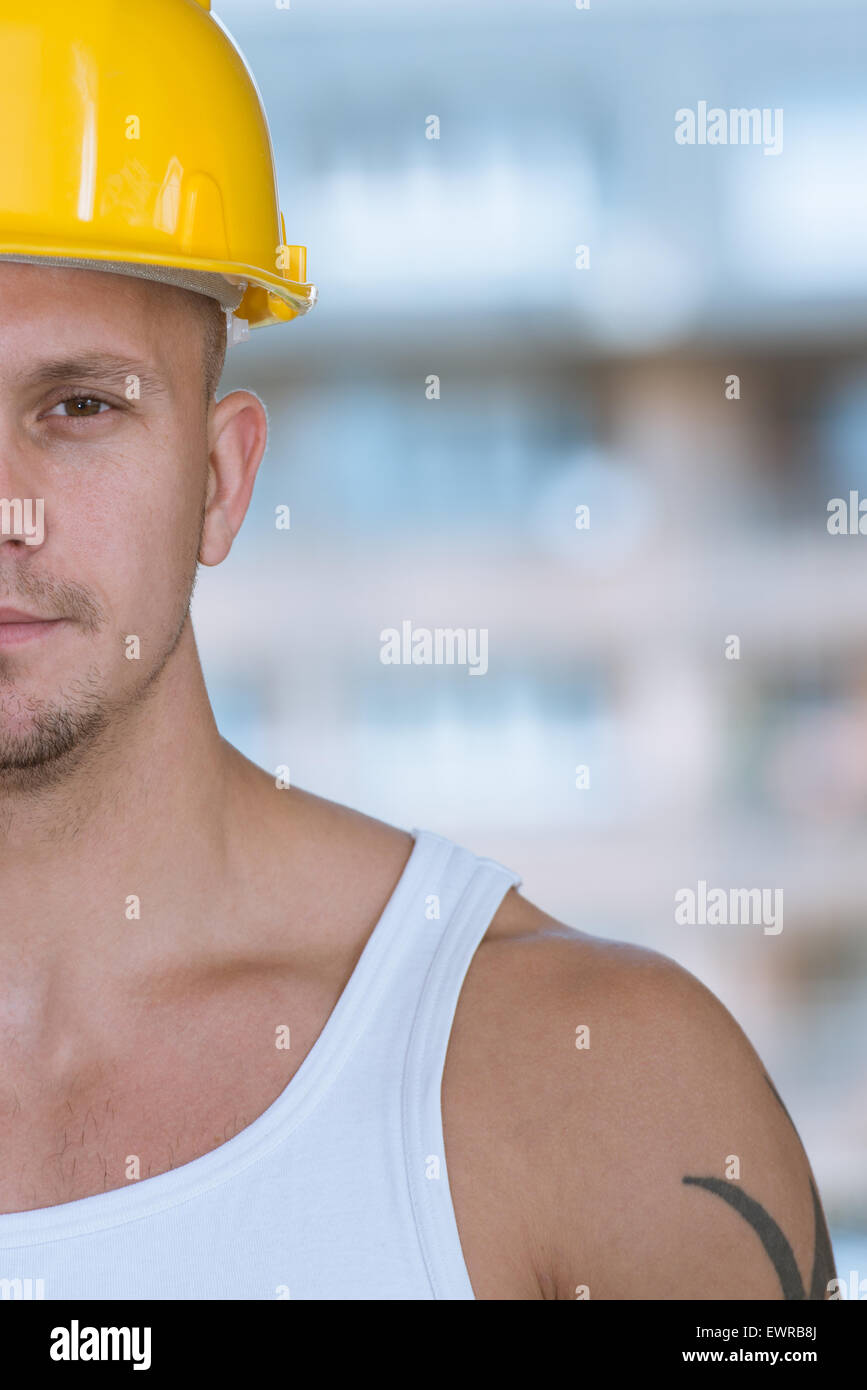 Portrait Of Handsome Engineer With Yellow Helmet Stock Photo - Alamy