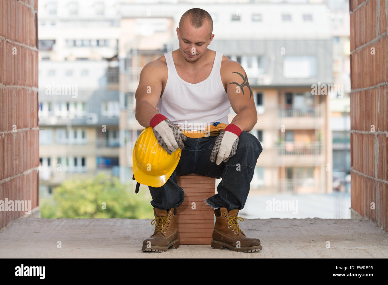 Construction Worker Relaxing The Fresh Air During Work Stock Photo - Alamy