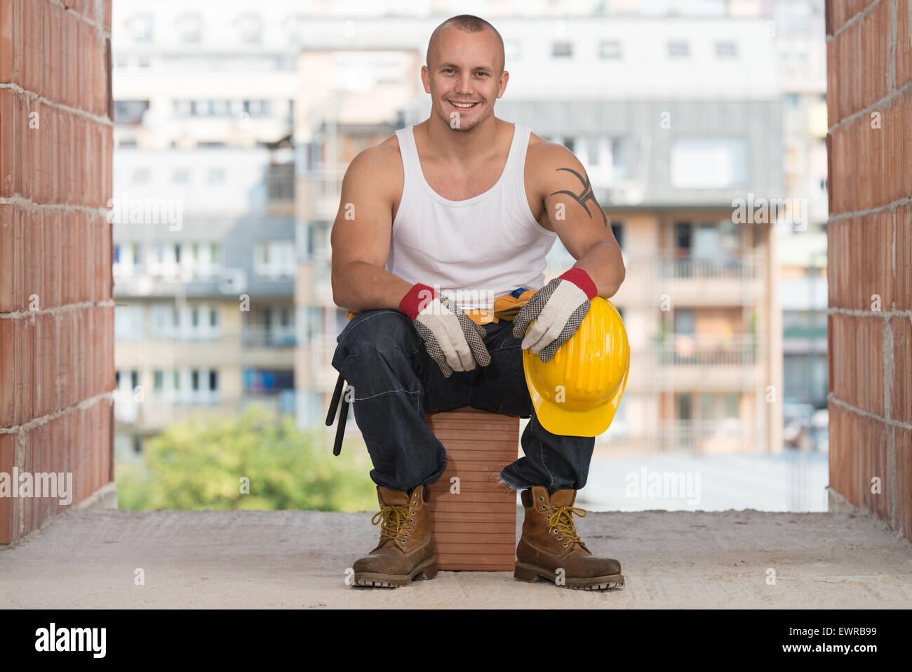 Construction Worker Relaxing The Fresh Air During Work Stock Photo - Alamy