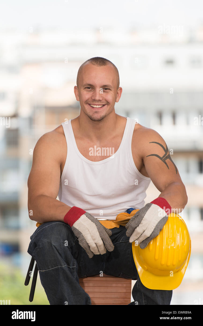 Construction Worker Relaxing The Fresh Air During Work Stock Photo - Alamy