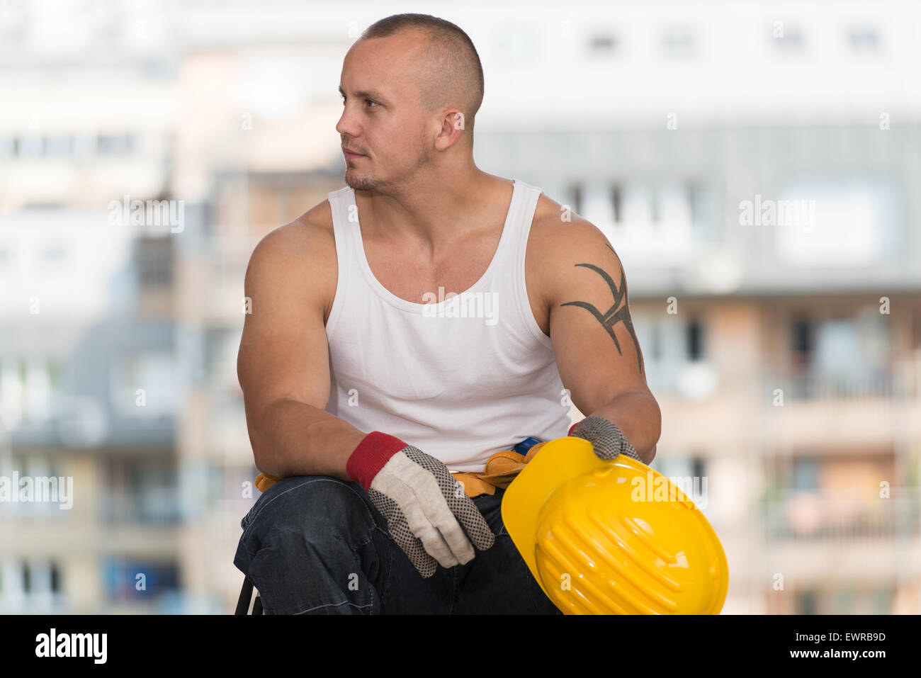 Construction Worker Relaxing The Fresh Air During Work Stock Photo - Alamy