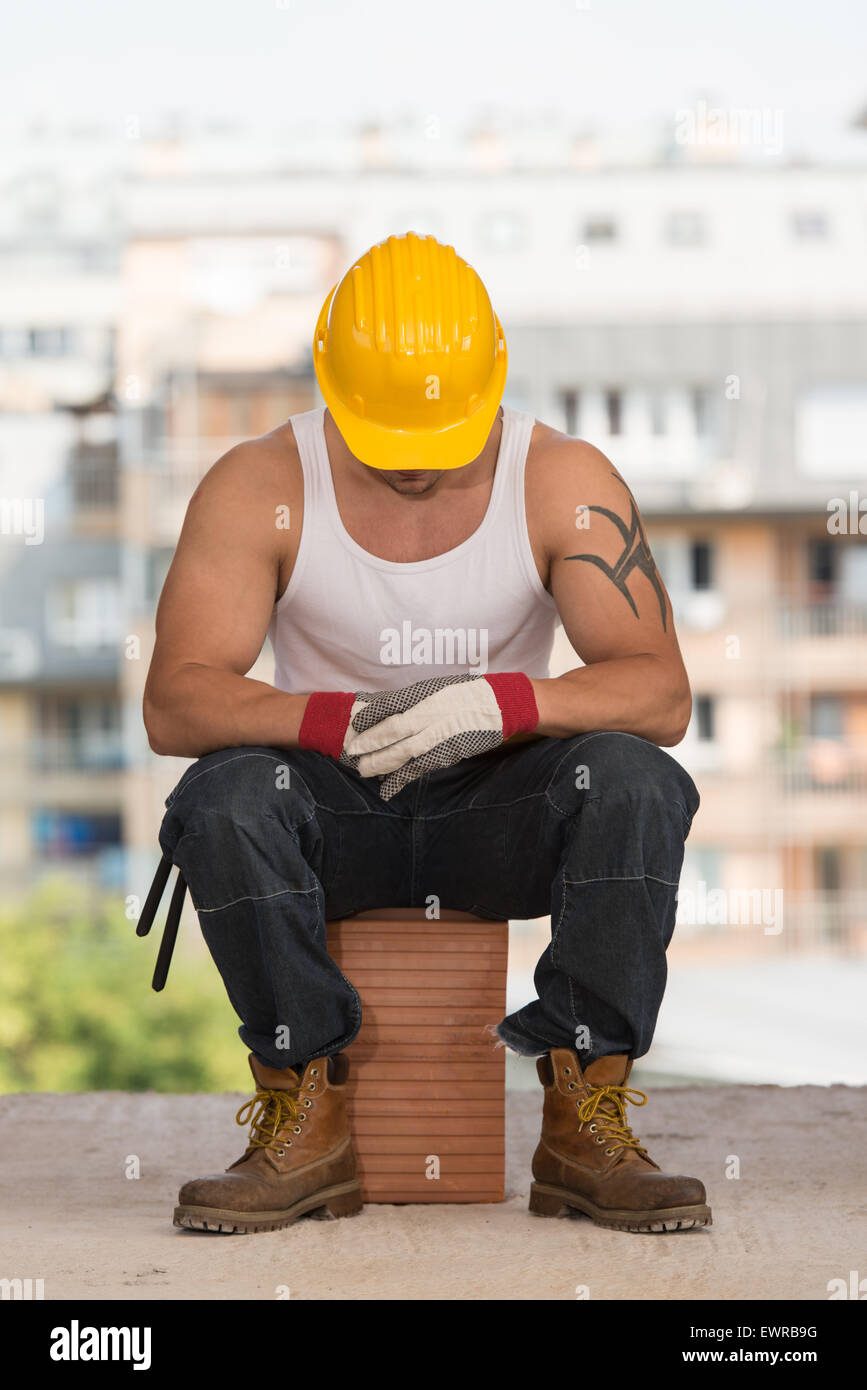 Construction Worker Relaxing The Fresh Air During Work Stock Photo - Alamy