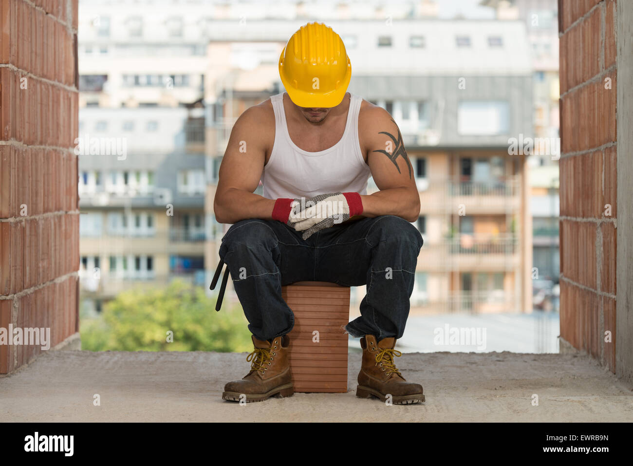 Construction Worker Relaxing The Fresh Air During Work Stock Photo - Alamy