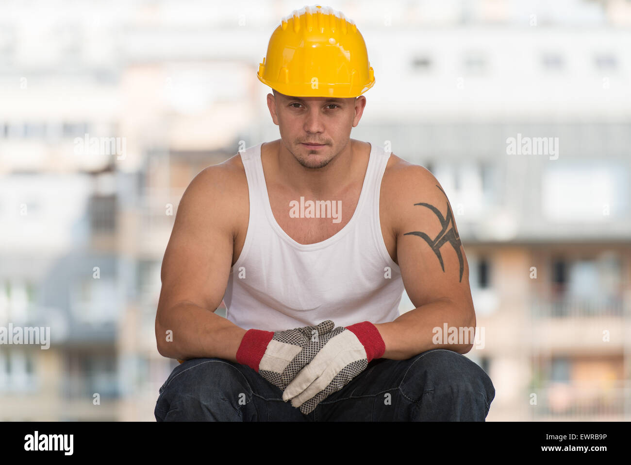 Construction Worker Relaxing The Fresh Air During Work Stock Photo - Alamy