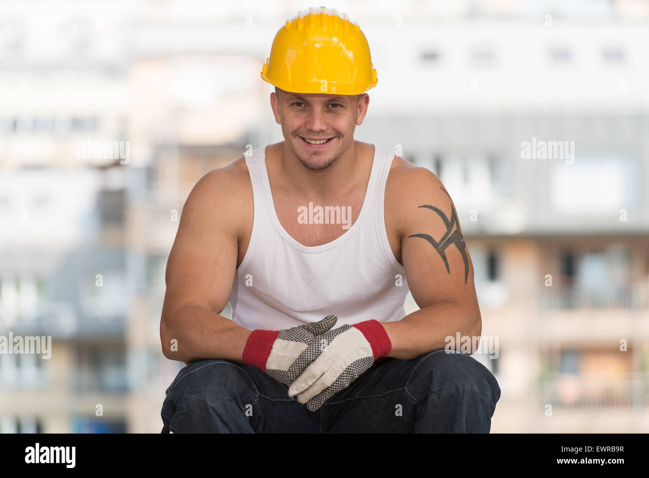 Construction Worker Relaxing The Fresh Air During Work Stock Photo - Alamy