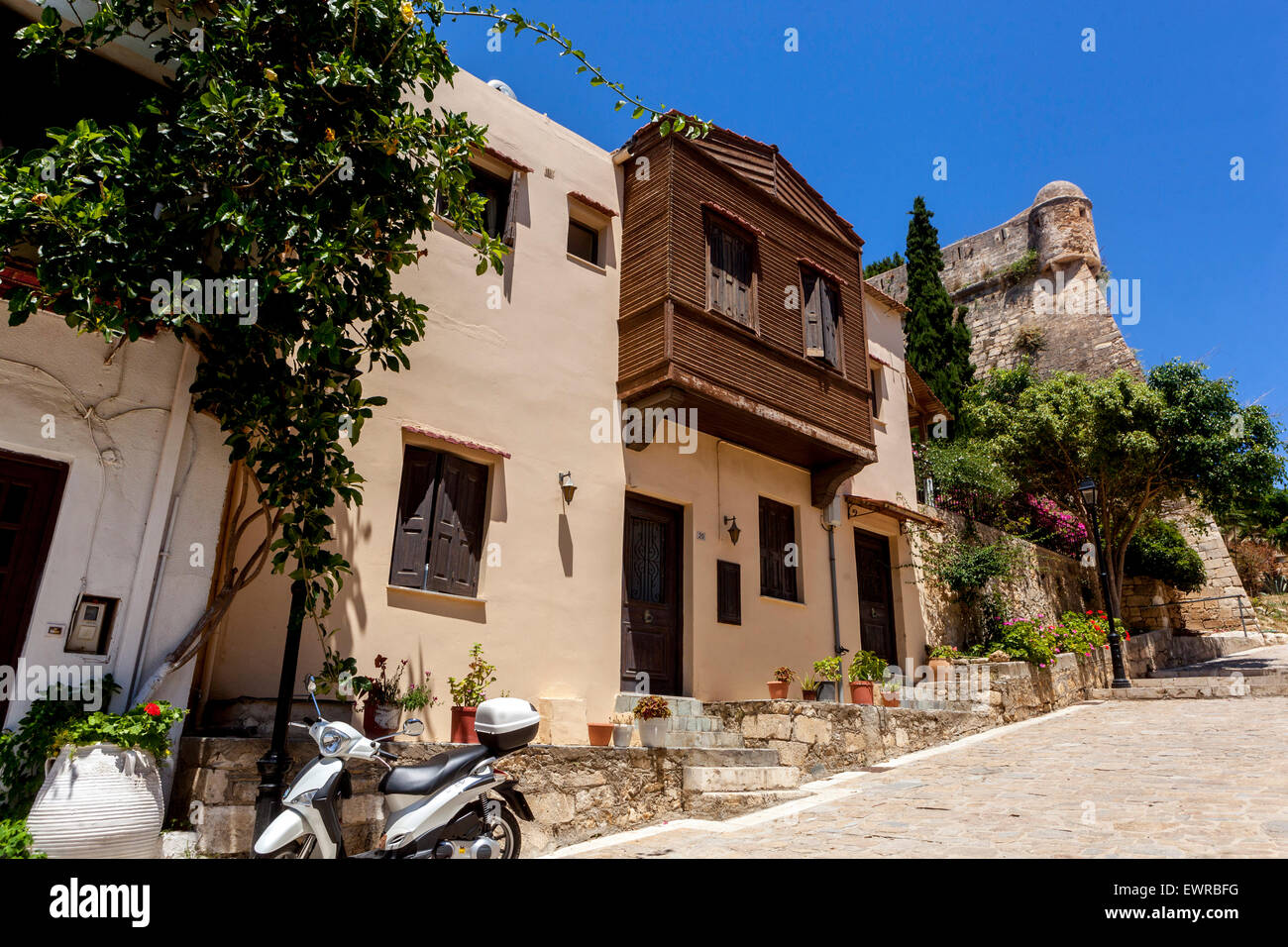 Old rustical houses on street to Fortezza Crete Rethymno fortress ...