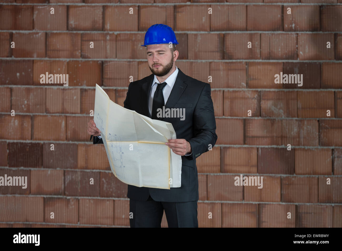 Construction in blue collar suit hi-res stock photography and images ...