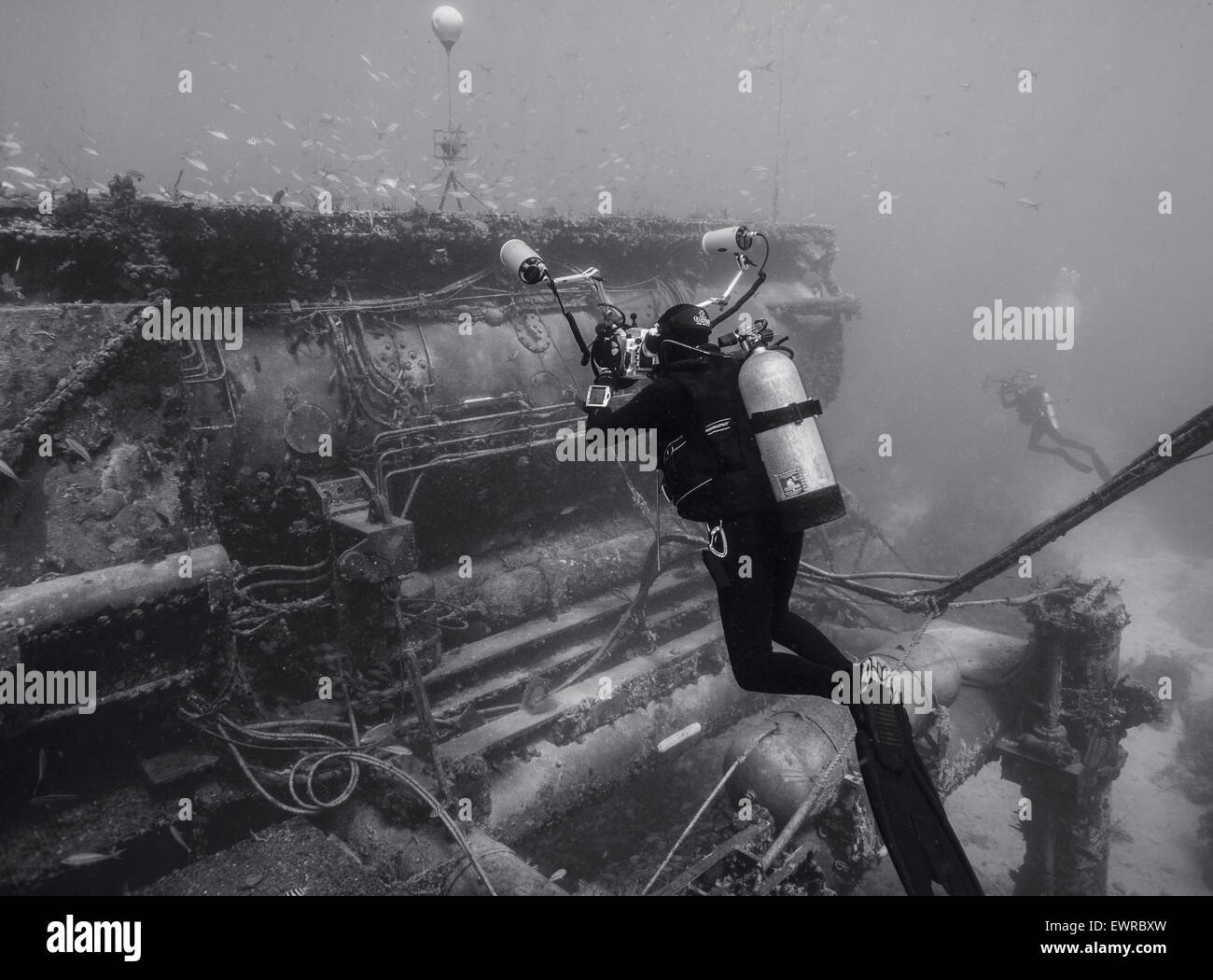 Photographer taking pictures outside the Aquarius Habitat at Conch Reef ...