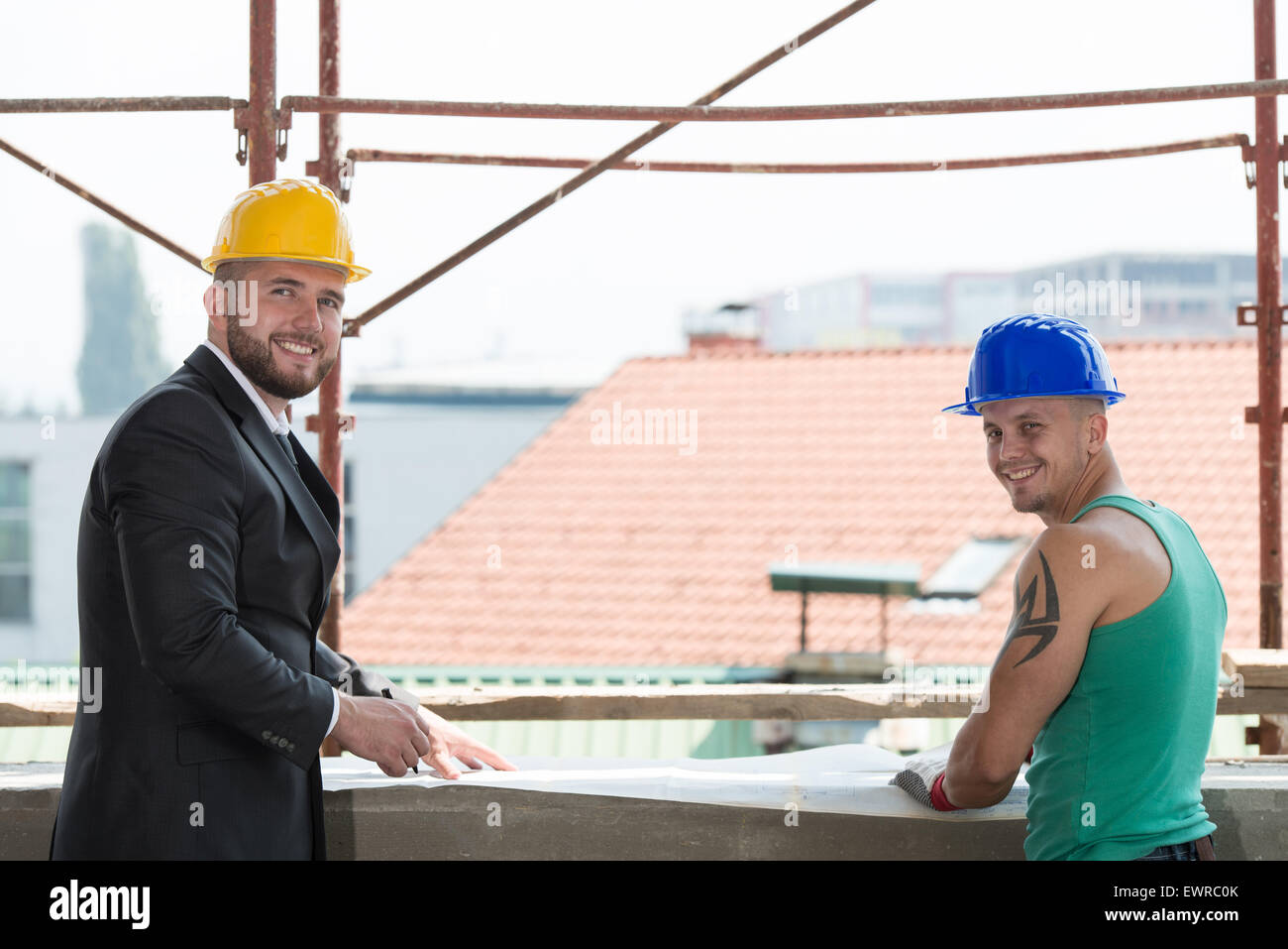 Group Of Male Architect And Construction Worker On Construction Site ...