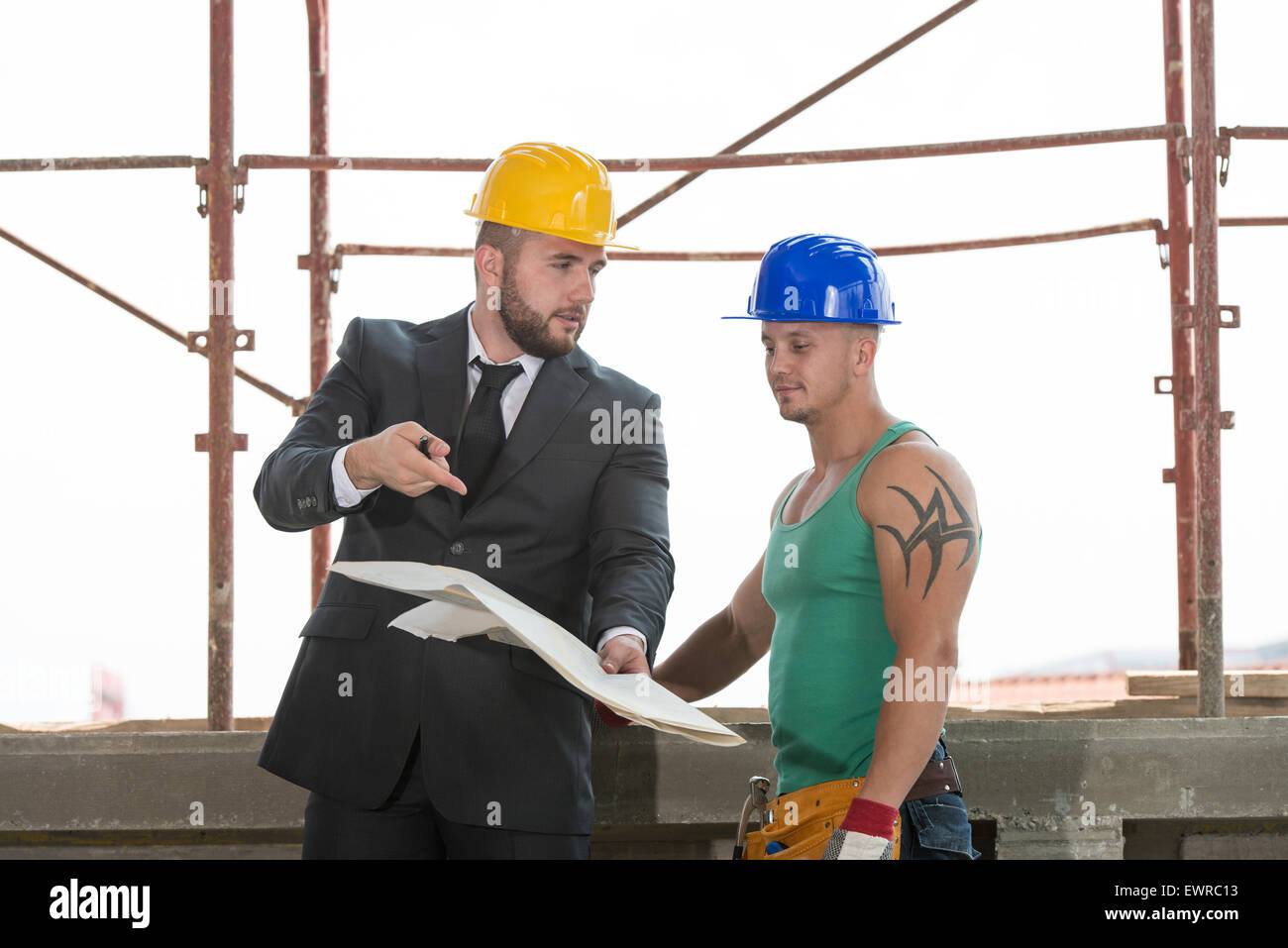 Group Of Male Architect And Construction Worker On Construction Site ...