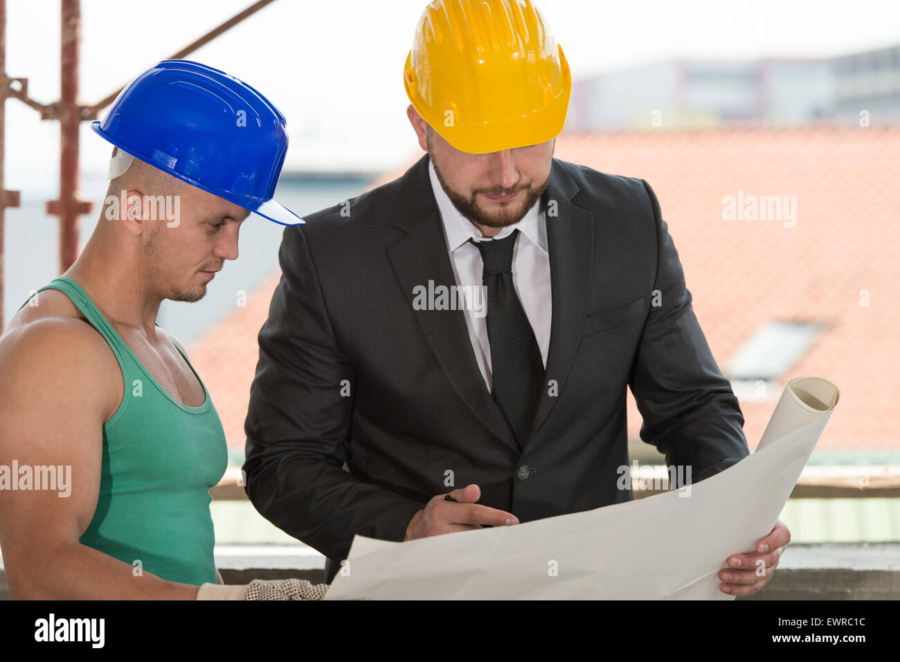 Group Of Male Architect And Construction Worker On Construction Site ...