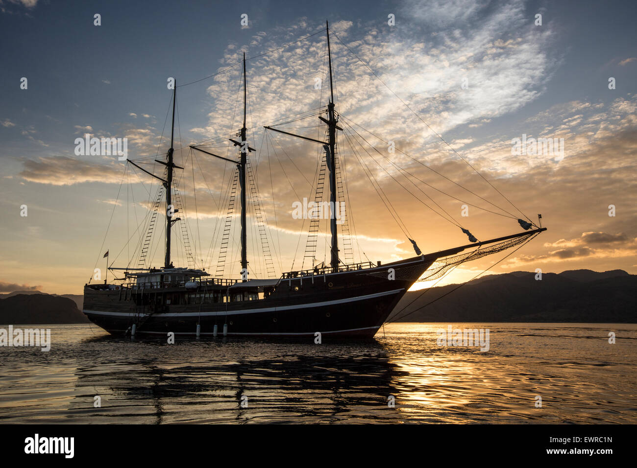 Liveaboard dive vessel at anchorage in the Komodo Islands Stock Photo ...