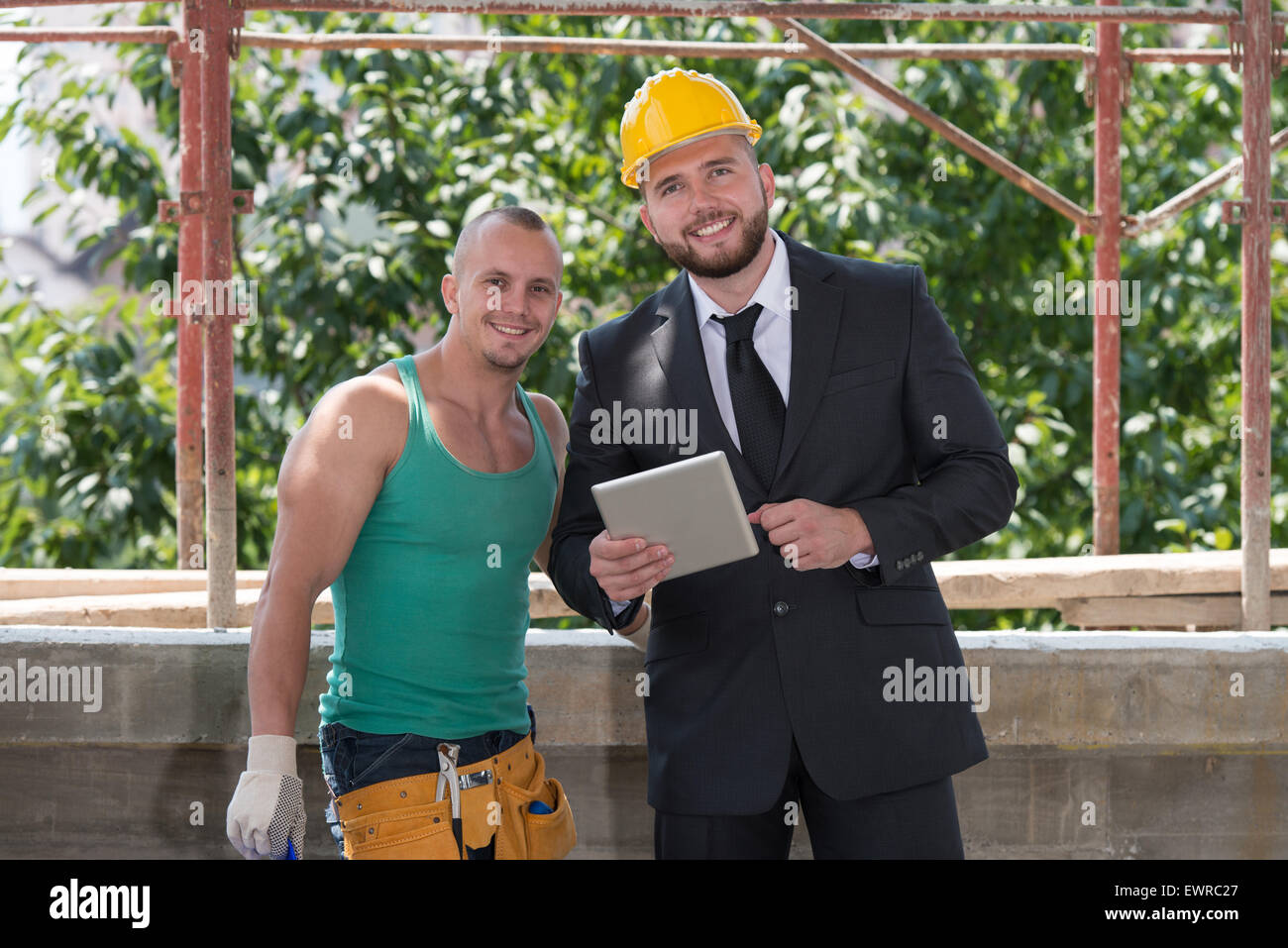 Group Of Male Architect And Construction Worker On Construction Site ...