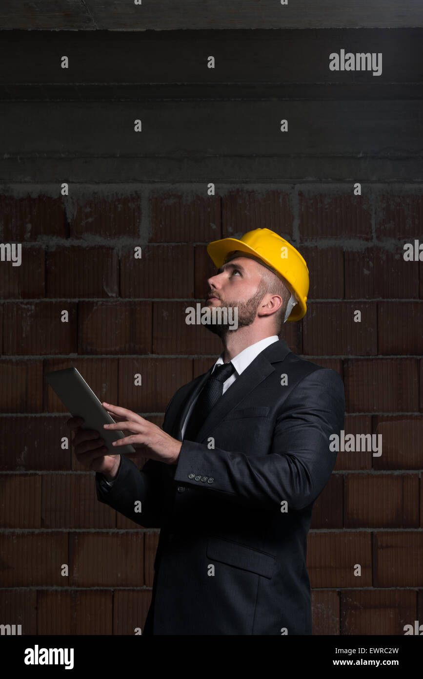 Portrait Of Construction Master With Personal Computer In Hands Stock ...