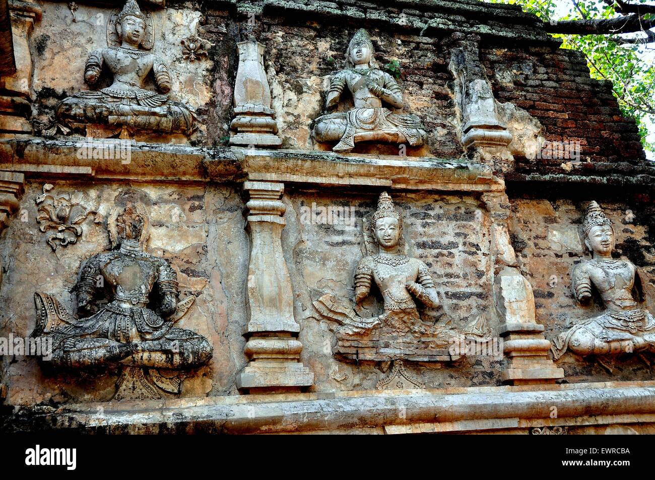 Chiang Mai, Thailand: Bas relief figures of Hindu-style deities adorn ...