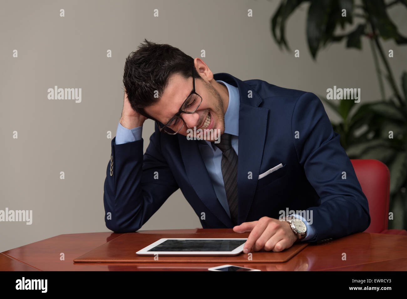 Young Business Man With Problems And Stress In The Office Stock Photo ...
