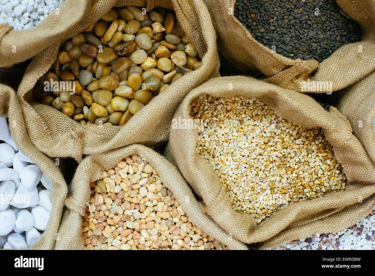Sacks with decorative stones. Close up Stock Photo - Alamy