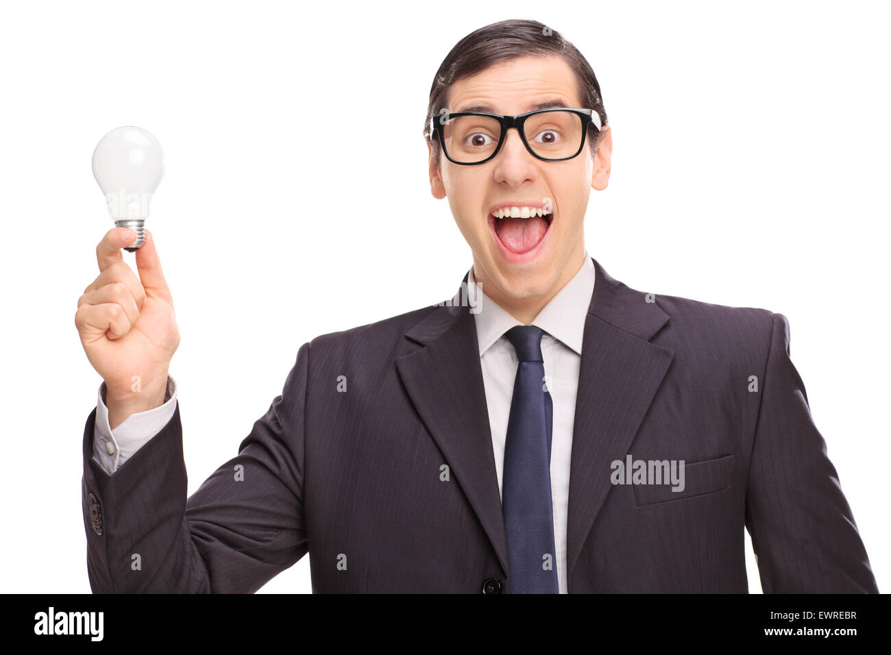 Young excited businessman in a black suit holding a light bulb and ...