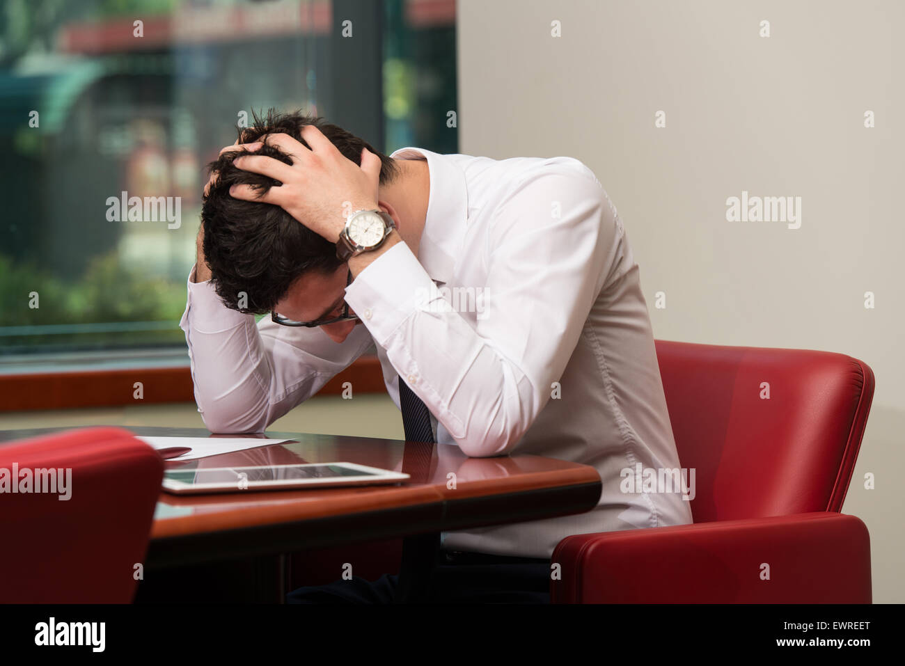 Young Business Man With Problems And Stress In The Office Stock Photo ...
