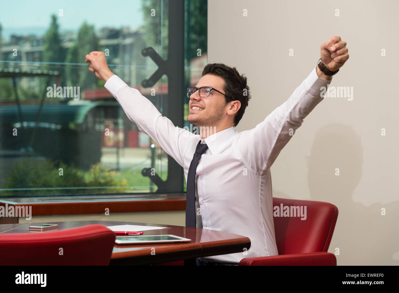 Guy with arms up business suit hi-res stock photography and images - Alamy