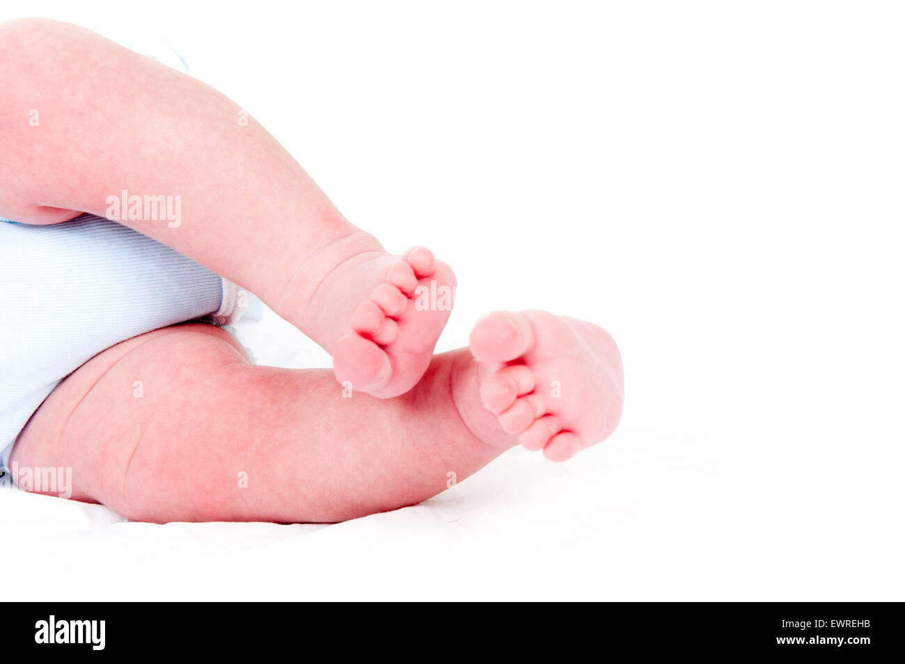 New born feet over white background Stock Photo - Alamy