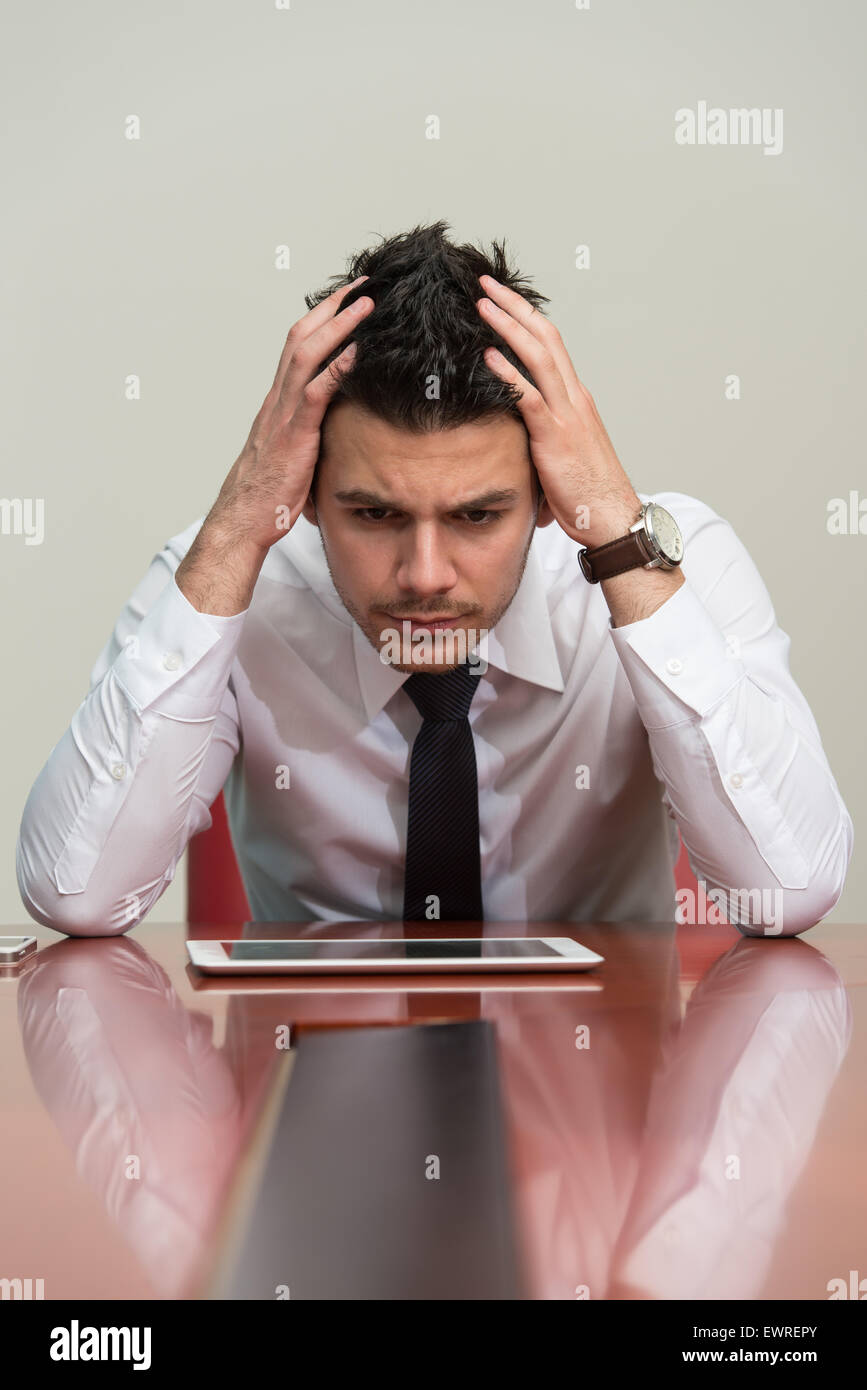Young Business Man With Problems And Stress In The Office Stock Photo ...